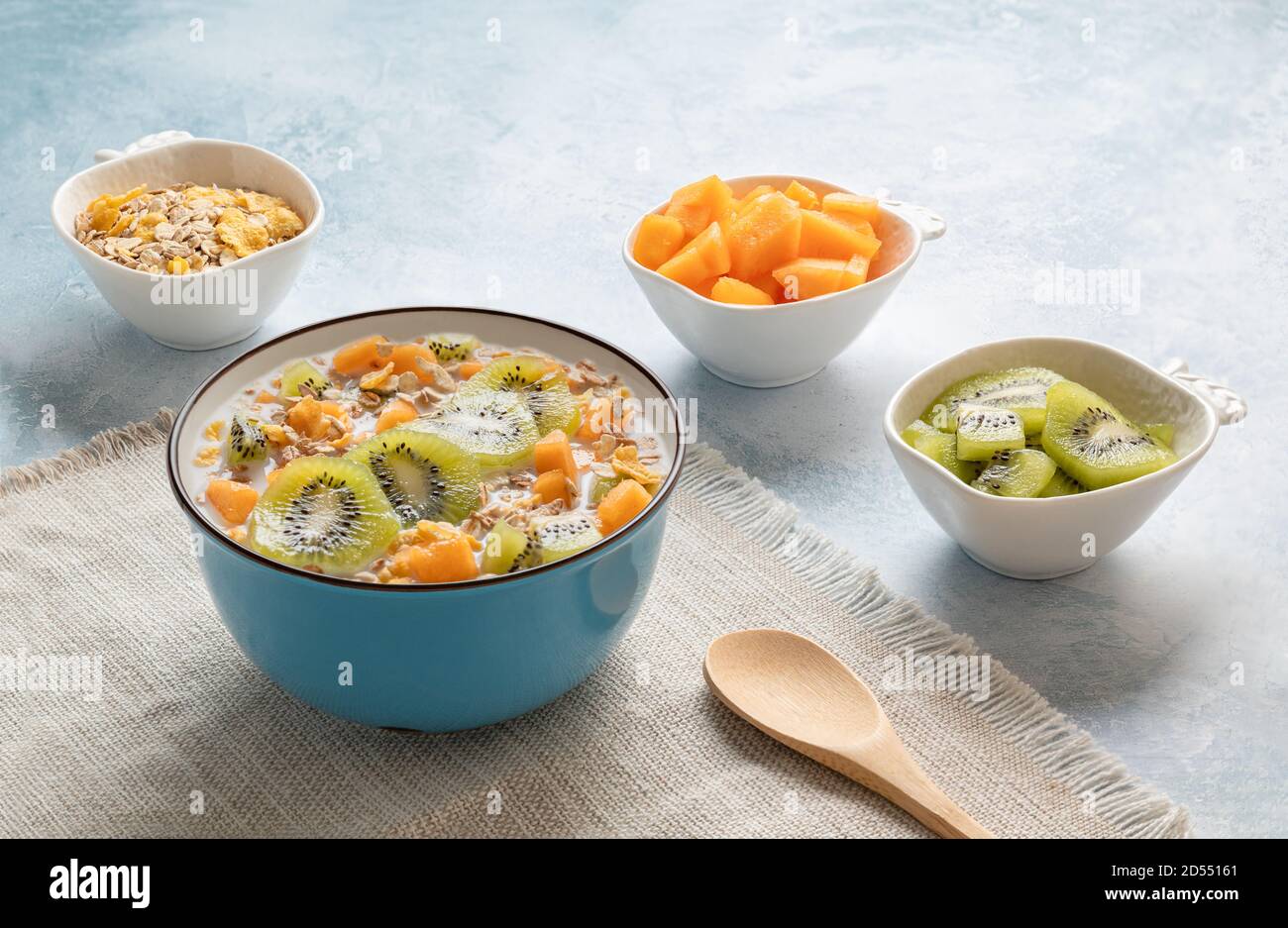 Fruit breakfast - muesli with kiwi and mango Stock Photo - Alamy