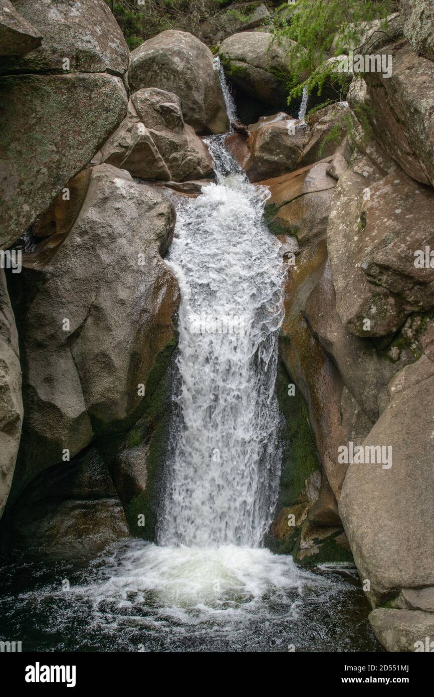 Vertical shot of a waterfall Stock Photo - Alamy