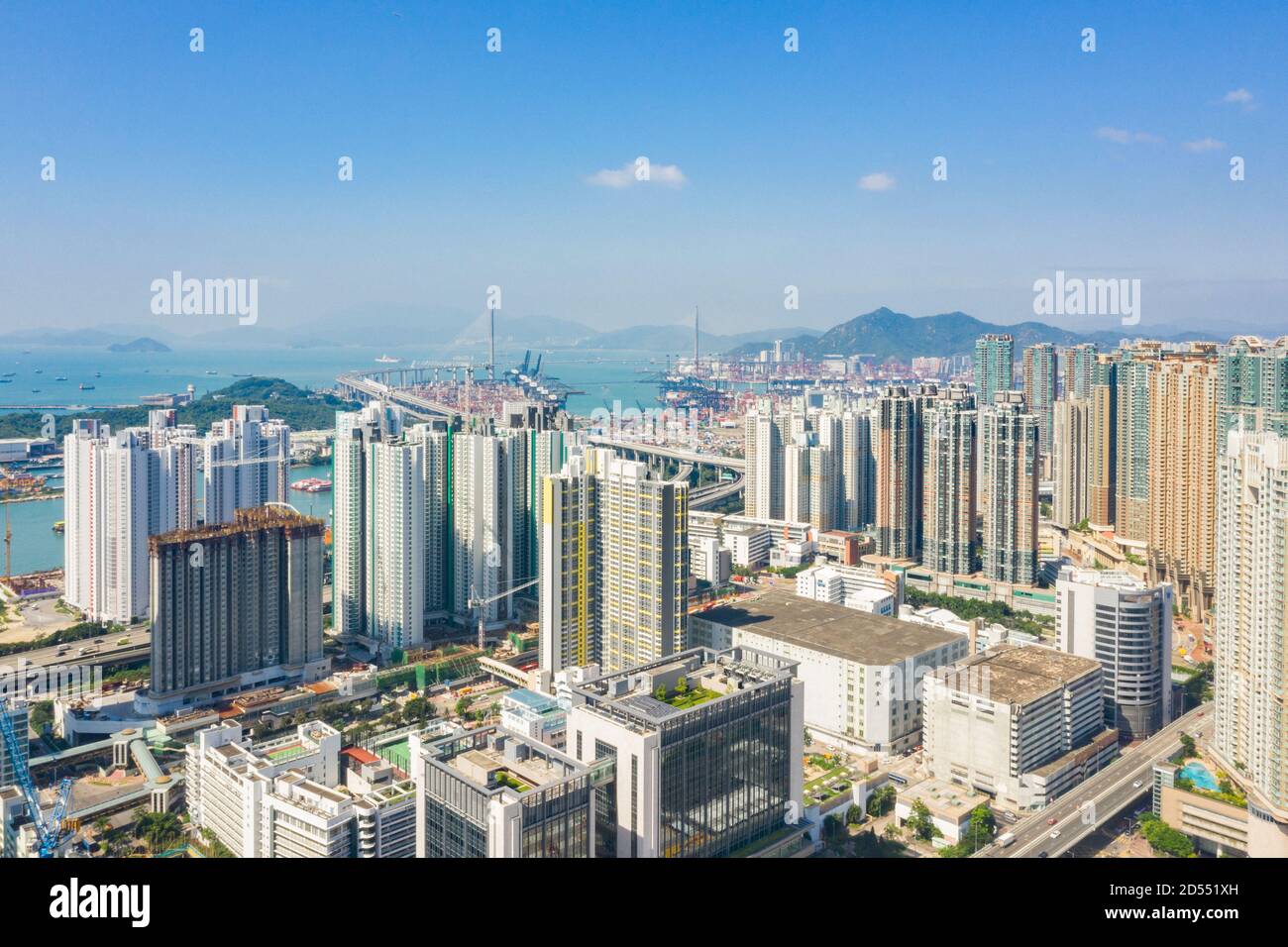 aerial view overlooking the densly populated areas of Mong Kong and ...