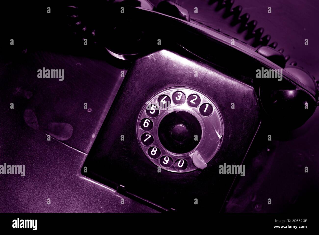 Retro style landline telephone. Vintage dial telephone with a coiled ...