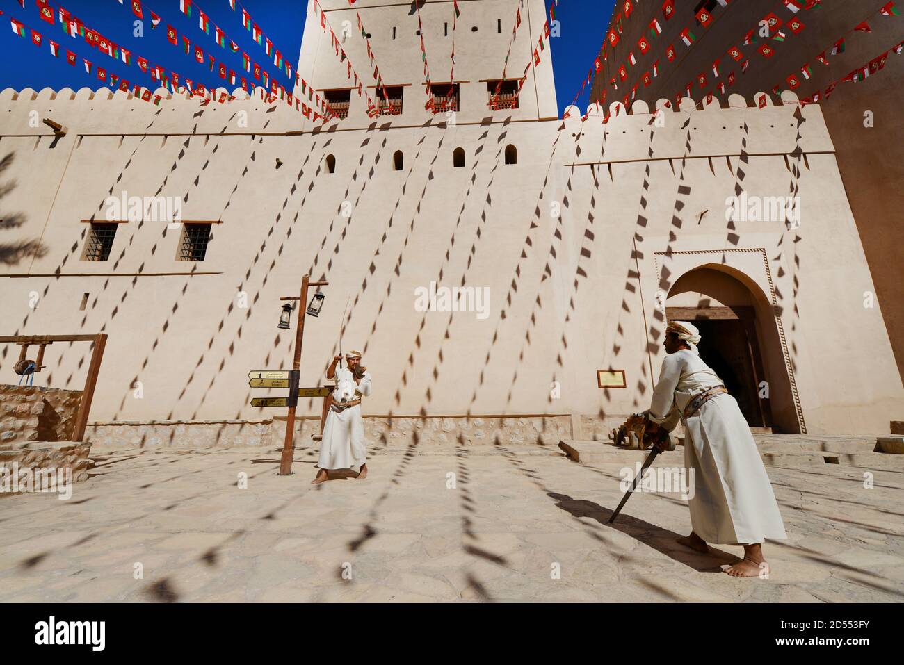 Traditional Omani sword dance in Nizwa fort, Oman Stock Photo - Alamy