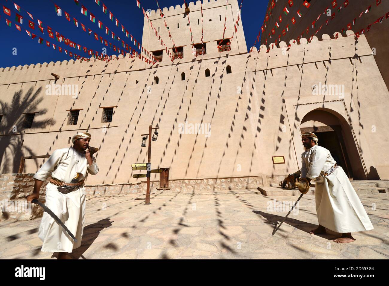 Traditional Omani sword dance in Nizwa fort, Oman Stock Photo - Alamy