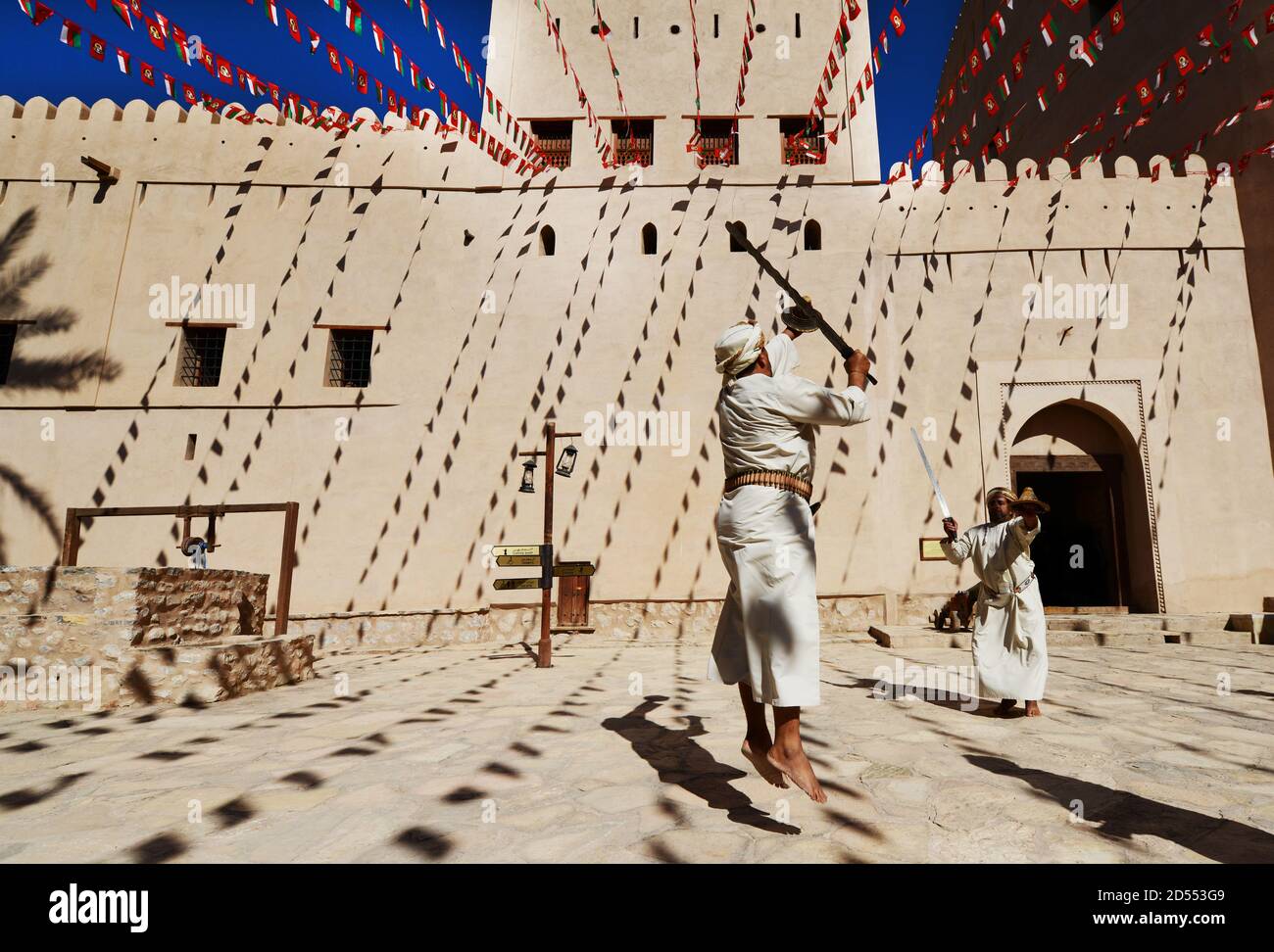 Traditional Omani sword dance in Nizwa fort, Oman Stock Photo - Alamy