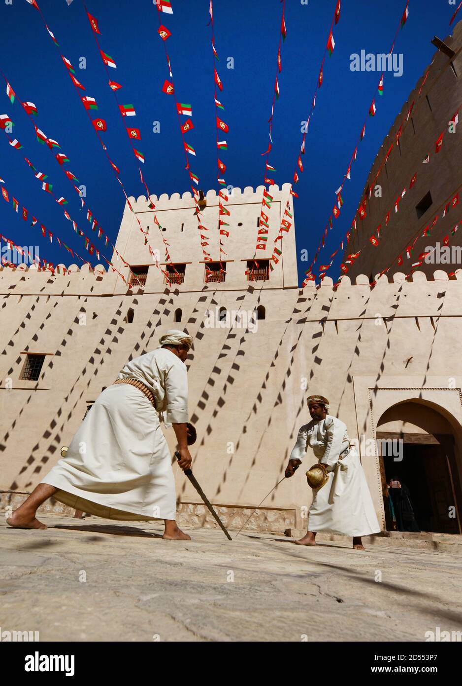 Traditional Omani sword dance in Nizwa fort, Oman Stock Photo - Alamy