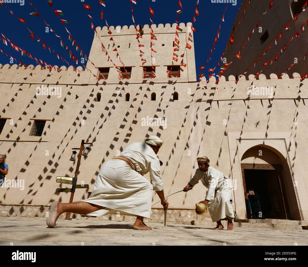 Traditional Omani sword dance in Nizwa fort, Oman Stock Photo - Alamy