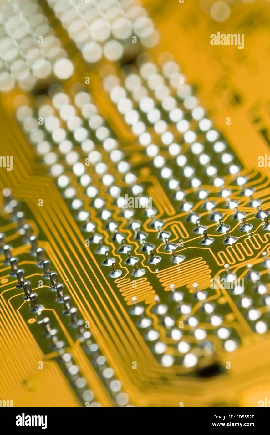 Yellow and green electronic board for computers Stock Photo - Alamy