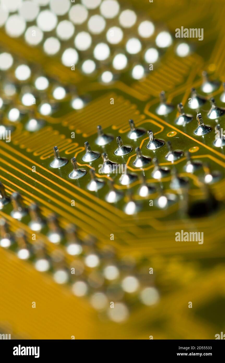 Yellow and green electronic board for computers Stock Photo - Alamy