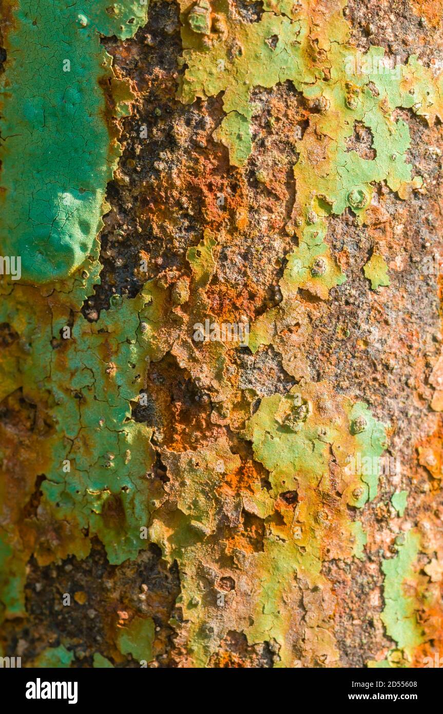 Rust on green painted metal bar Stock Photo - Alamy