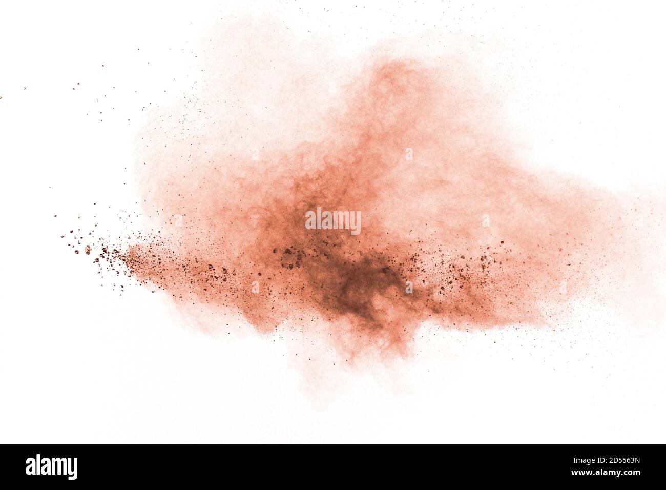 Brown powder explosion on white background Stock Photo - Alamy