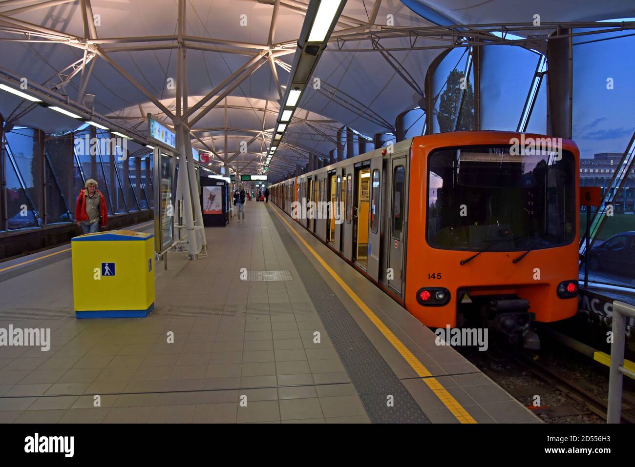 Passengers leaving a train at Erasmus metro station, Brussels, Belgium ...