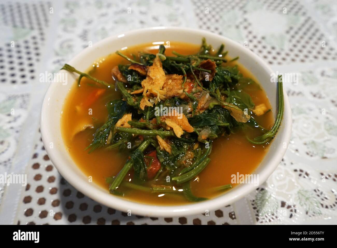 Close up Sweet leaf soup (Star gooseberry) with roasted fish ,Northern ...