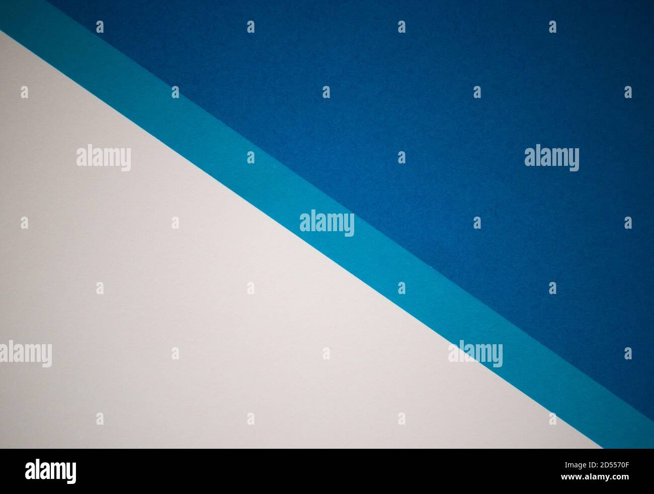 Blue and white diagonally divided background Stock Photo - Alamy