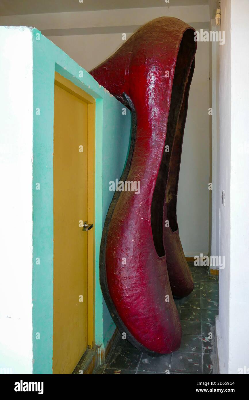 Giant Woman's Heel as a Symbol of the Bathroom Stock Photo - Alamy