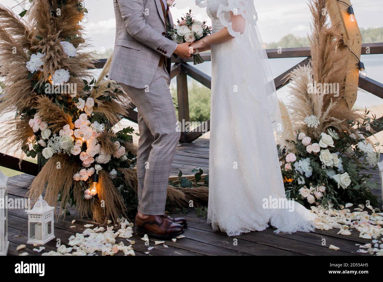 a bride and groom at the wedding ceremony Stock Photo - Alamy