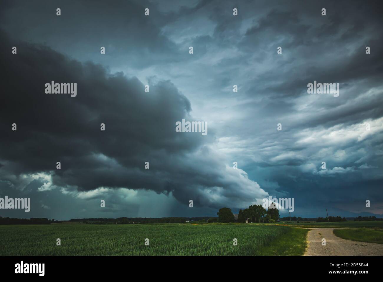 Supercell storm clouds with wall cloud and intense rain Stock Photo - Alamy