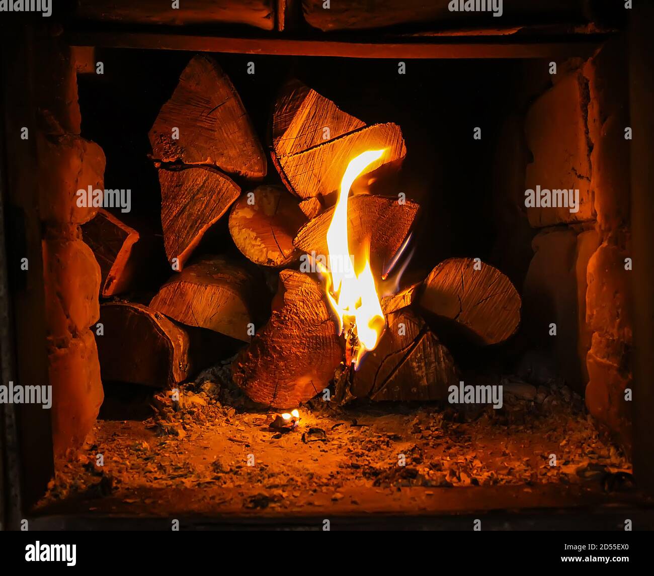 Lighting firewood in stove warm hi-res stock photography and images - Alamy