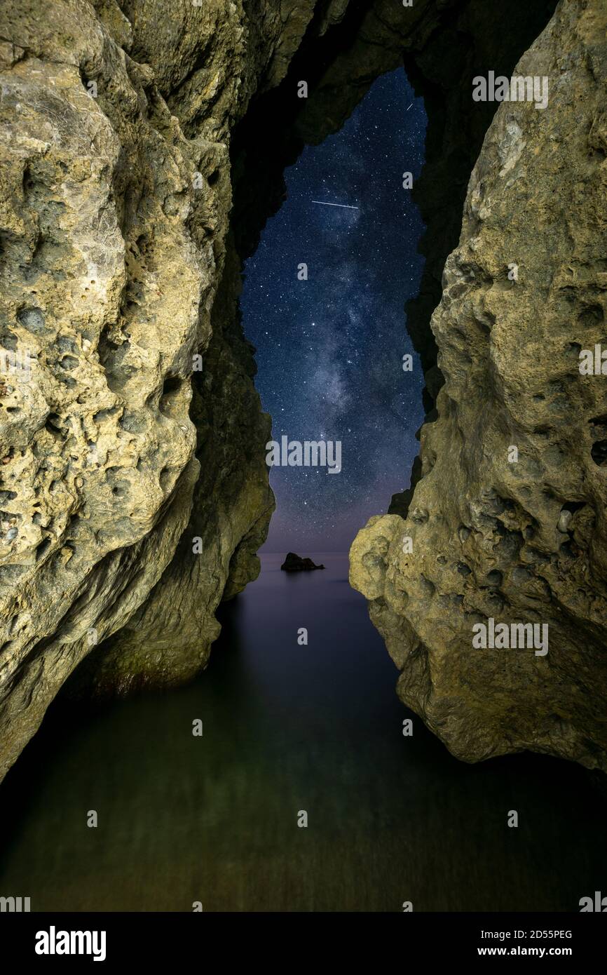 View from a rock grotto by the sea, Rhodos, Greece Stock Photo - Alamy