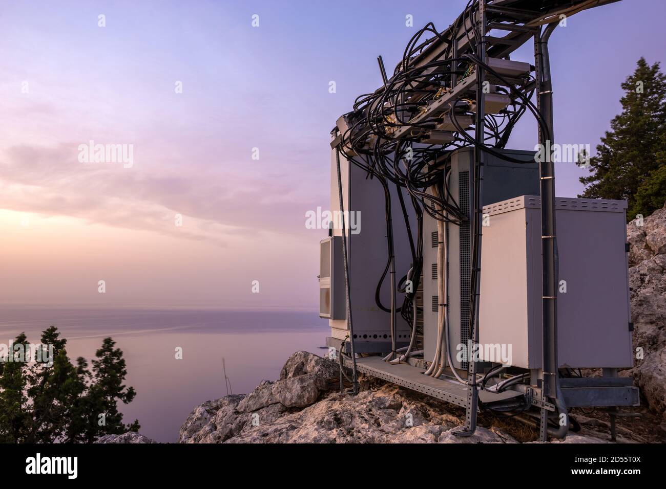 Mobile phone base station located on the mountain above the Aegean Sea ...