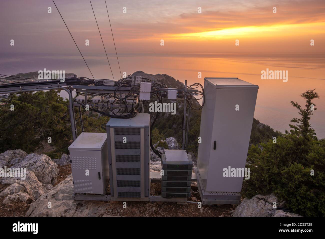 Mobile phone base station located on the mountain above the Aegean Sea ...