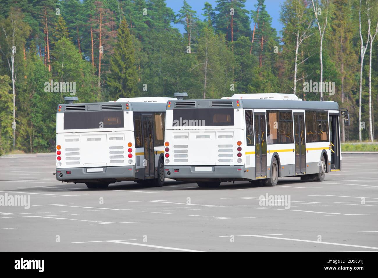 big tourist buses on parking Stock Photo - Alamy