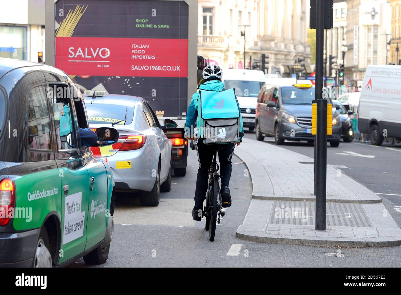 London, England, UK. Deliveroo cyclist in Regent Street Stock Photo - Alamy
