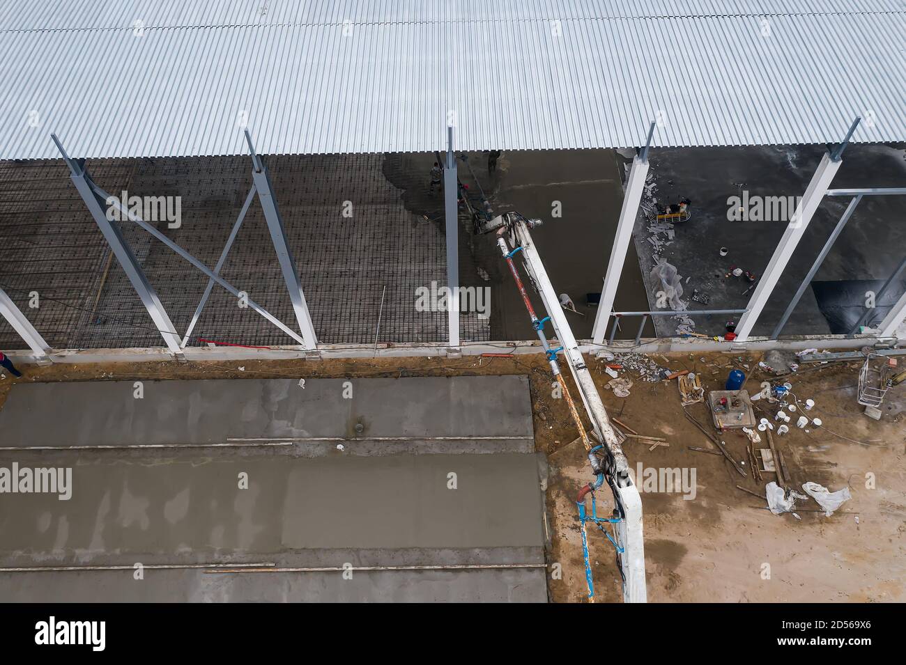 concrete floor filling in an industrial building Stock Photo - Alamy
