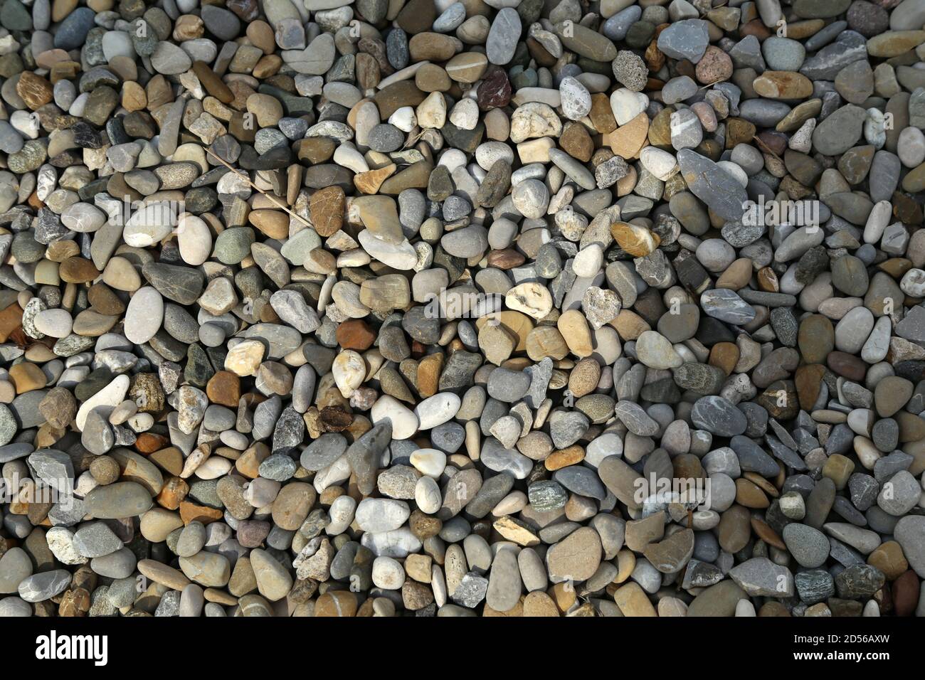 Abstract background with dry round stones Stock Photo - Alamy