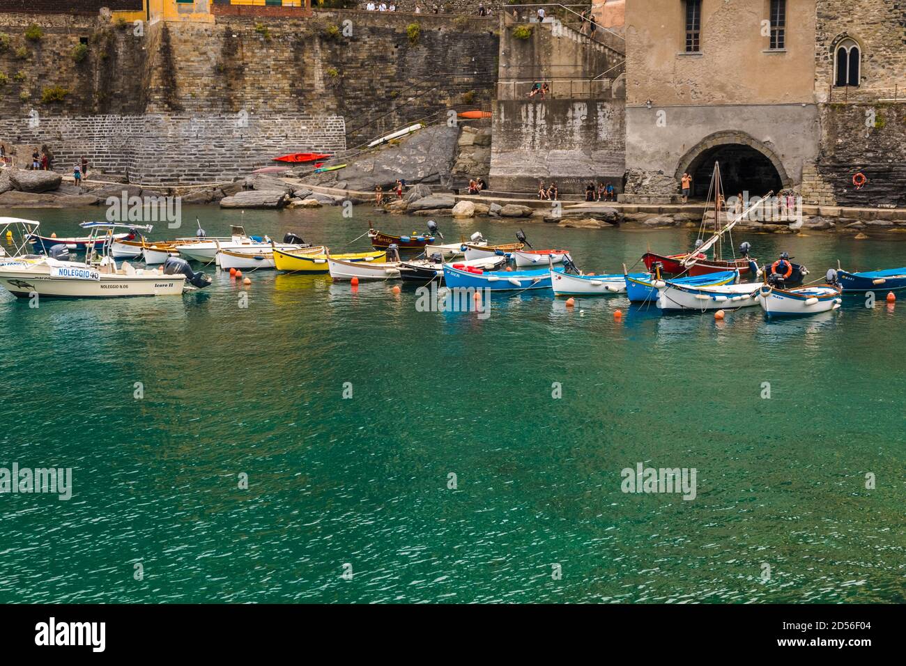 Lovely view of small boats in the shallow turquoise water, anchored in ...