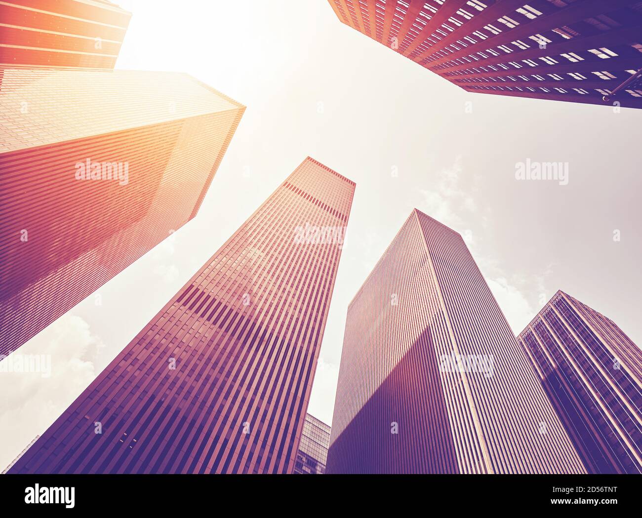 Color toned picture of skyscrapers in Manhattan at sunset, New York ...