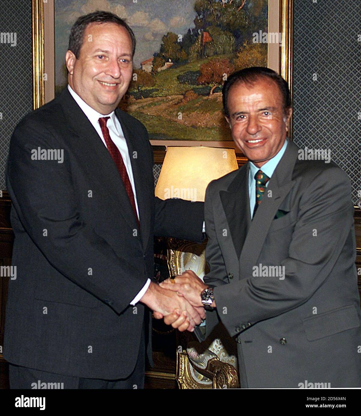 Argentine president carlos menem hands hi-res stock photography and ...