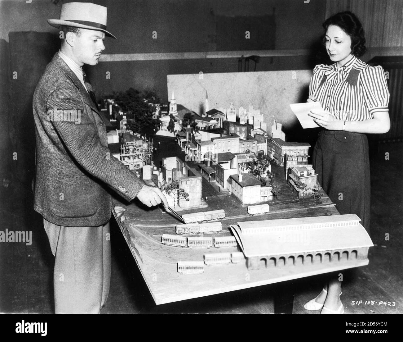 Art Director LYLE R. WHEELER and his Assistant studying Miniature Model ...