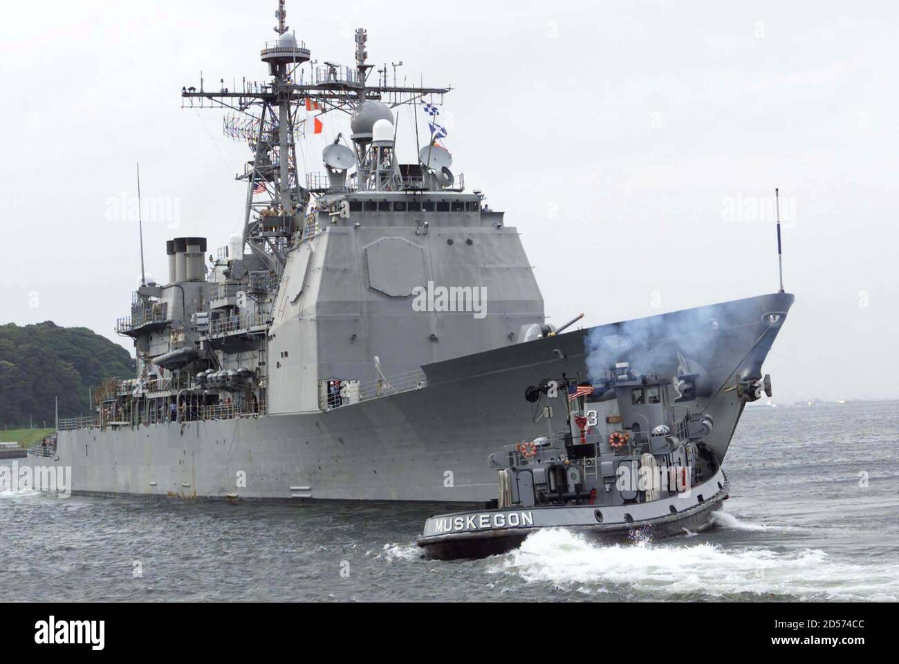 Tug Boat And War Ship High Resolution Stock Photography and Images - Alamy