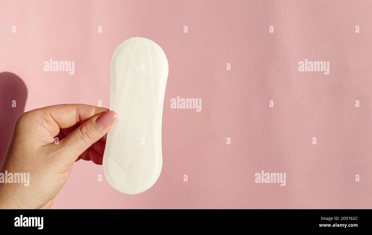 female intimate hygiene products on a pink background Stock Photo - Alamy