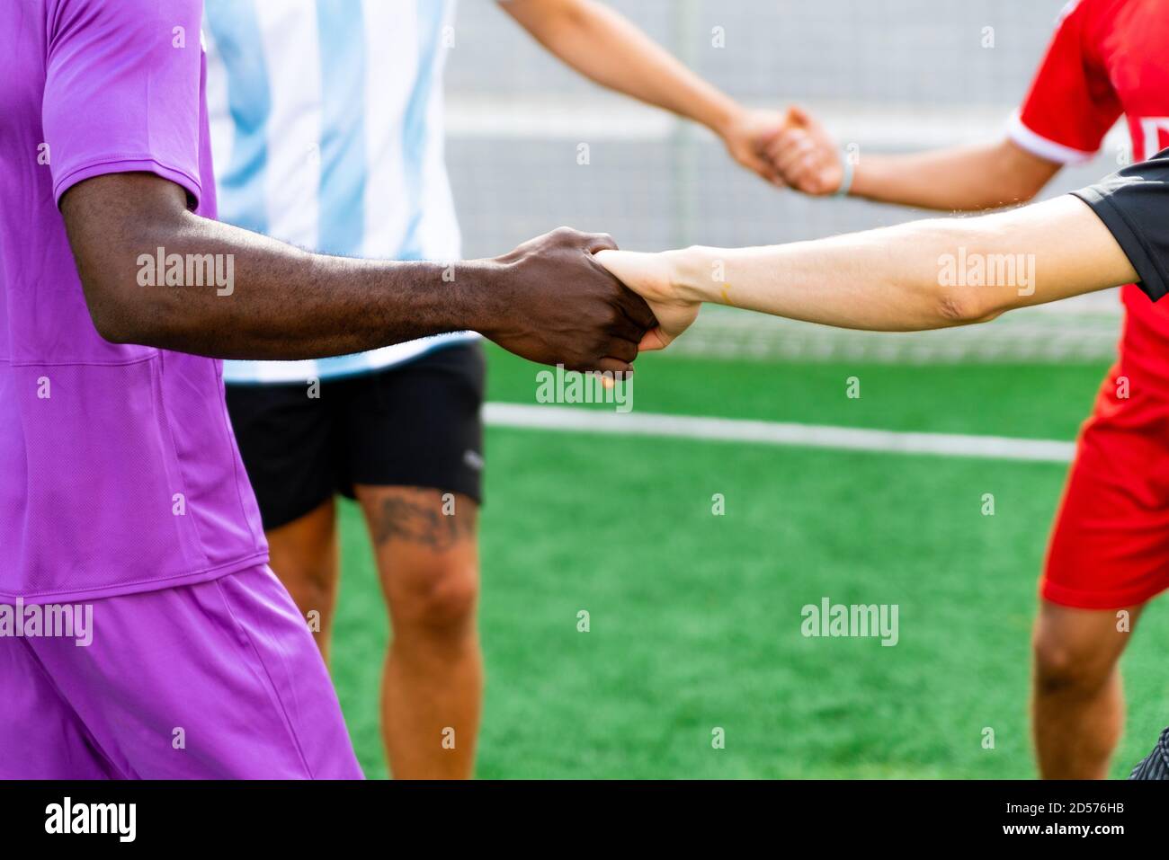 Hands together black white multiracial hi-res stock photography and ...