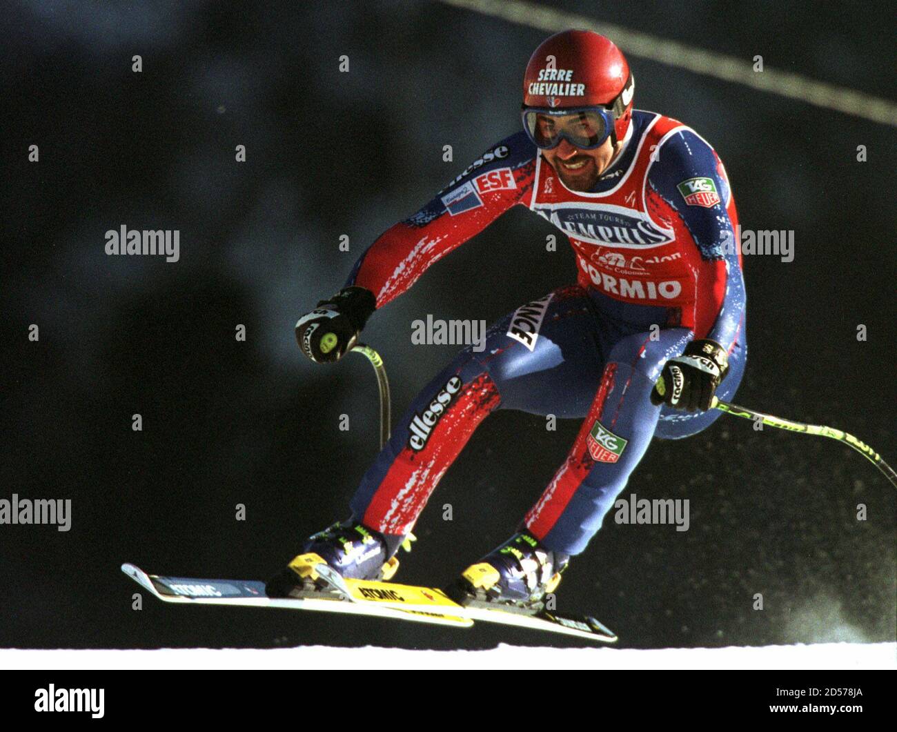 Frenchman Luc Alphand passes a gate on his way to victory in the Bormio ...