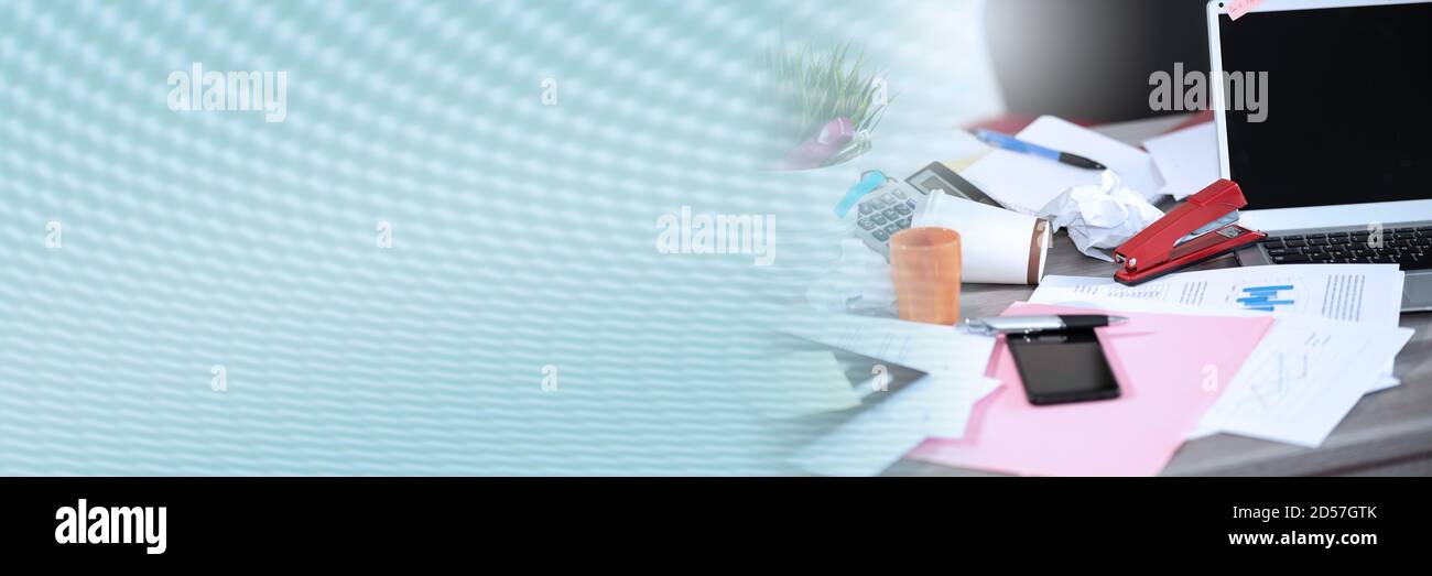 Messy and cluttered office desk; panoramic banner Stock Photo - Alamy