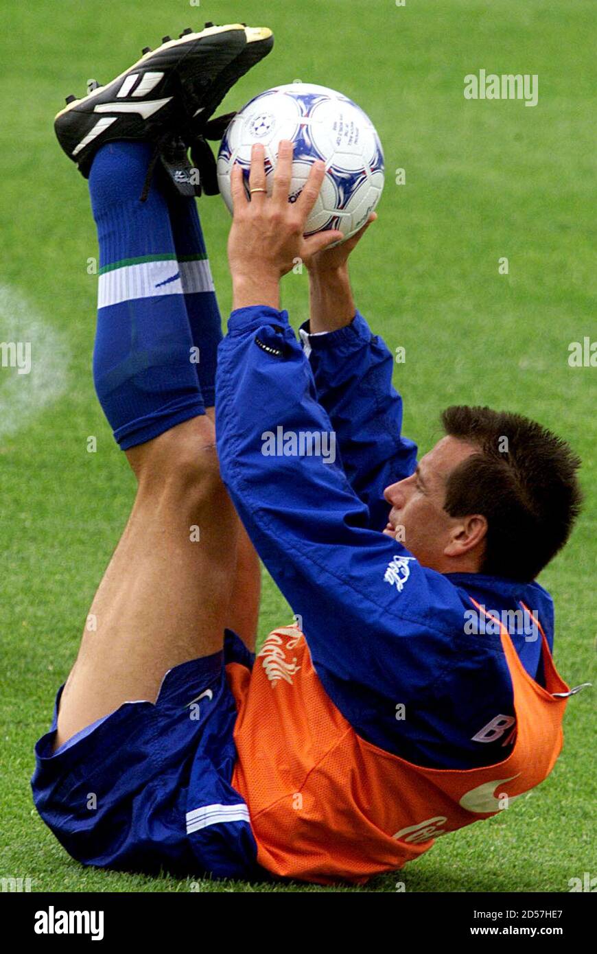 Brazilian team captain Dunga stretches with a soccer ball during a team ...