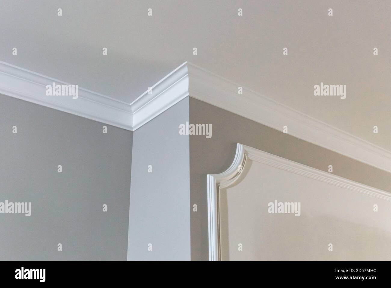 Detail of corner ceiling with intricate crown molding Stock Photo - Alamy