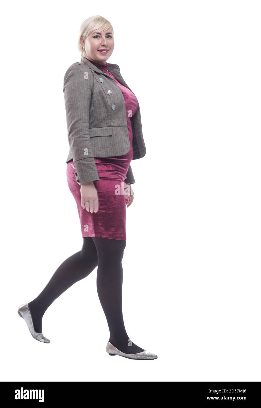 casual young woman stepping forward . isolated on a white Stock Photo ...