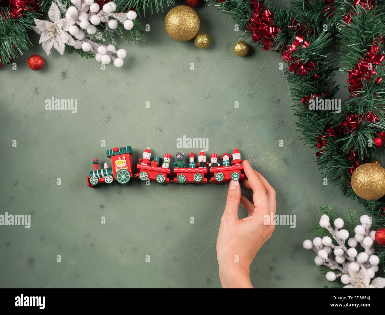 Christmas festive green background with toy train Stock Photo - Alamy