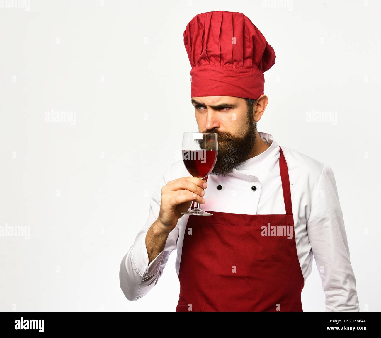 Sommelier and italian drink concept. Cook with thoughtful face in ...