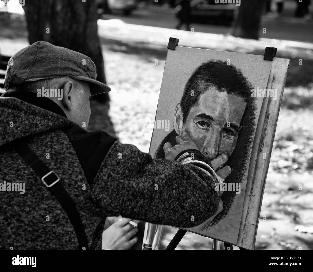 LVIV / UKRAINE - OCTOBER 06, 2018: Painter in the center of Lviv city ...