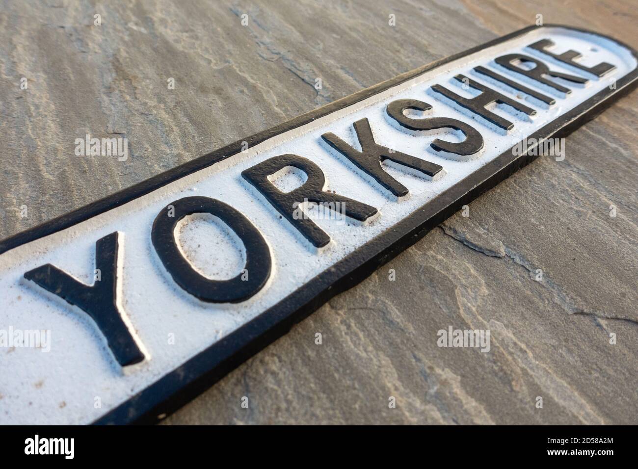 Yorkshire metal street name sign on Yorkshire stone Stock Photo - Alamy