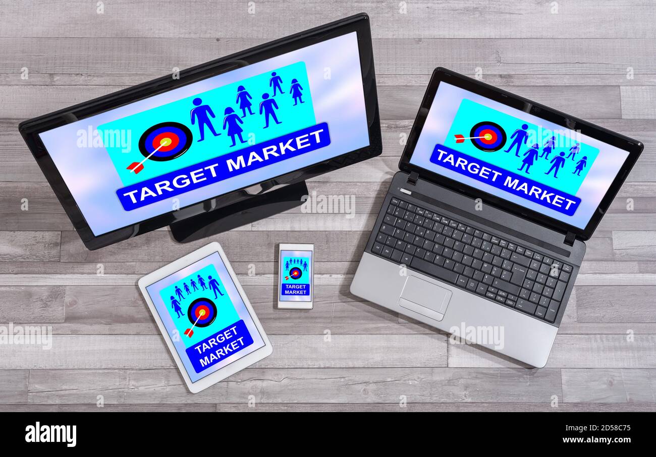 Target market concept shown on different information technology devices ...