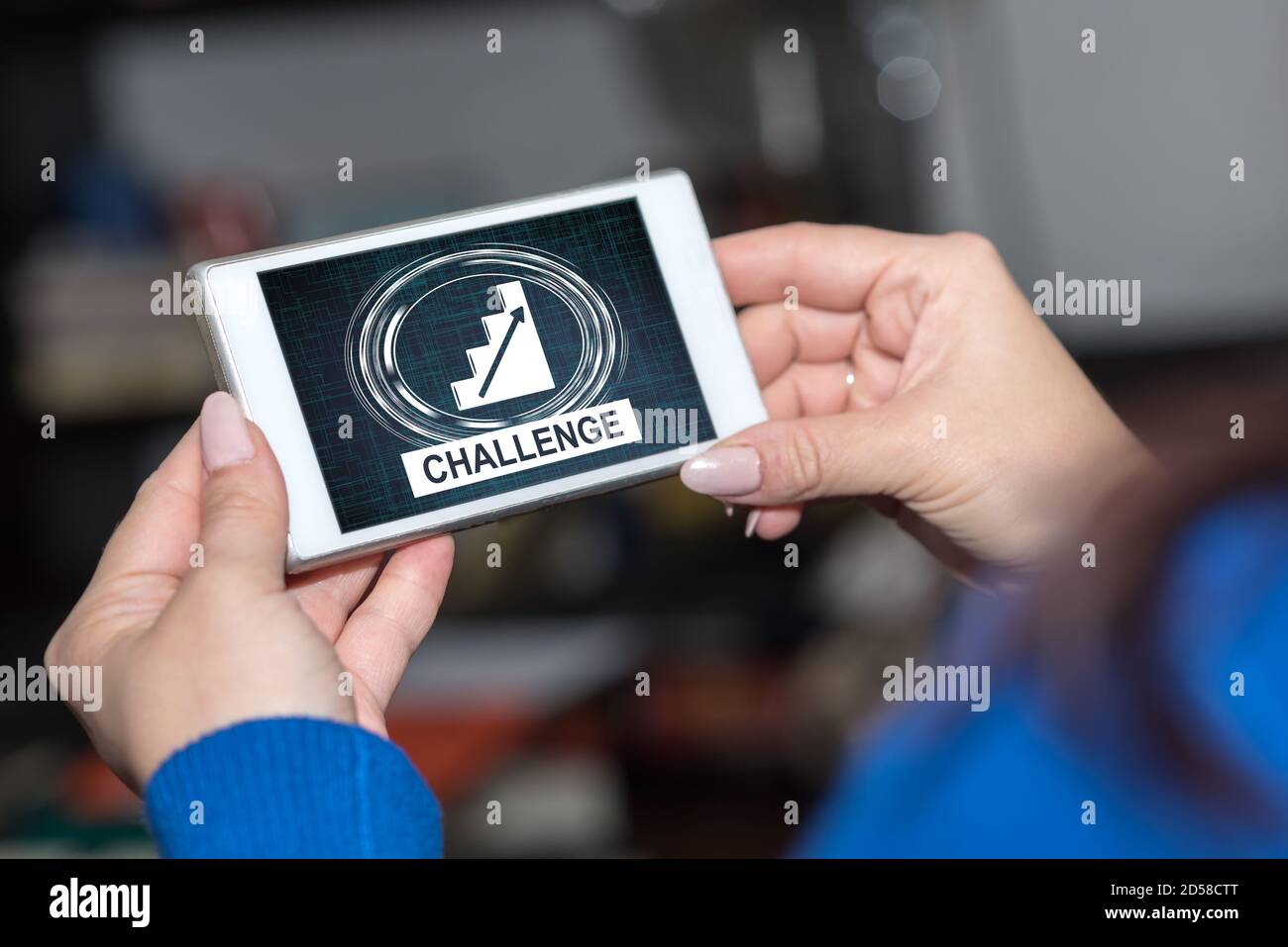 Smartphone screen displaying a challenge concept Stock Photo - Alamy