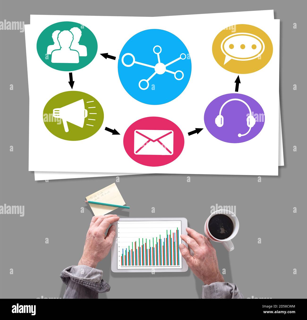Male hands using tablet in front of network communication concept Stock ...