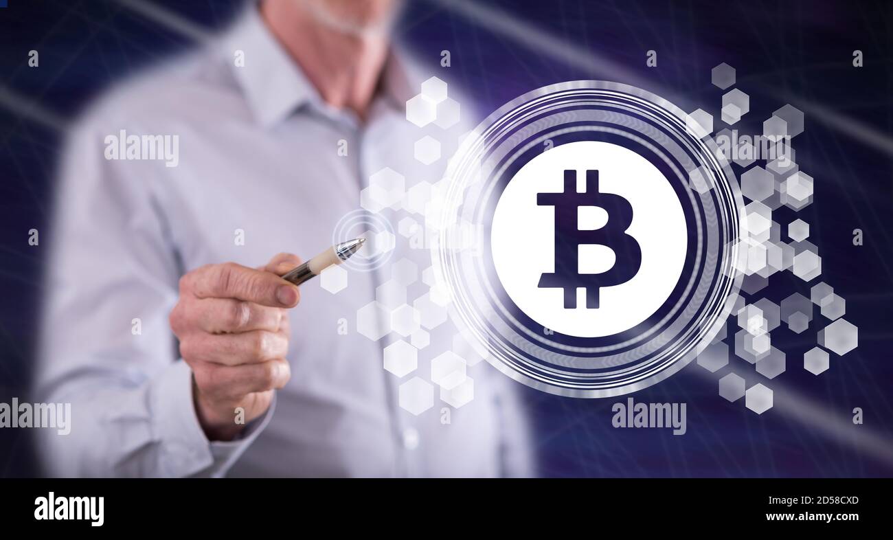 Man touching bitcoin concept hi-res stock photography and images - Alamy