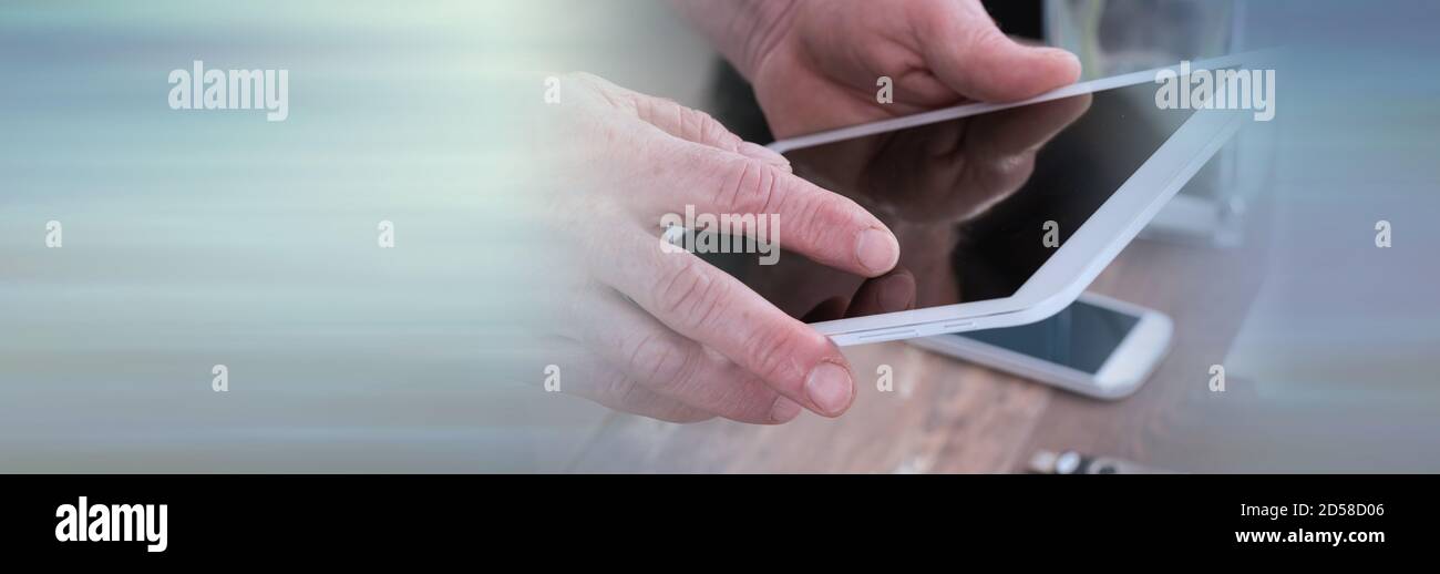 Finger touching tablet computer; panoramic banner Stock Photo - Alamy