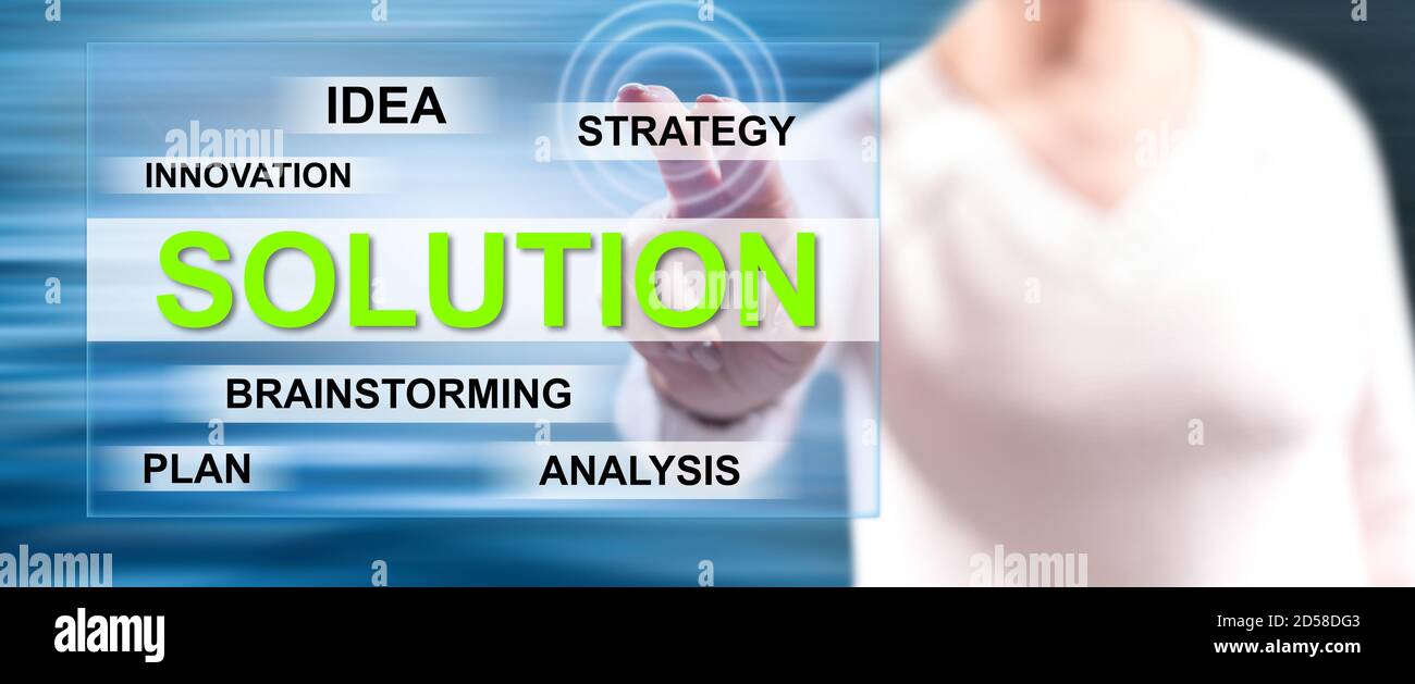 Woman touching a solution concept on a touch screen with her fingers ...