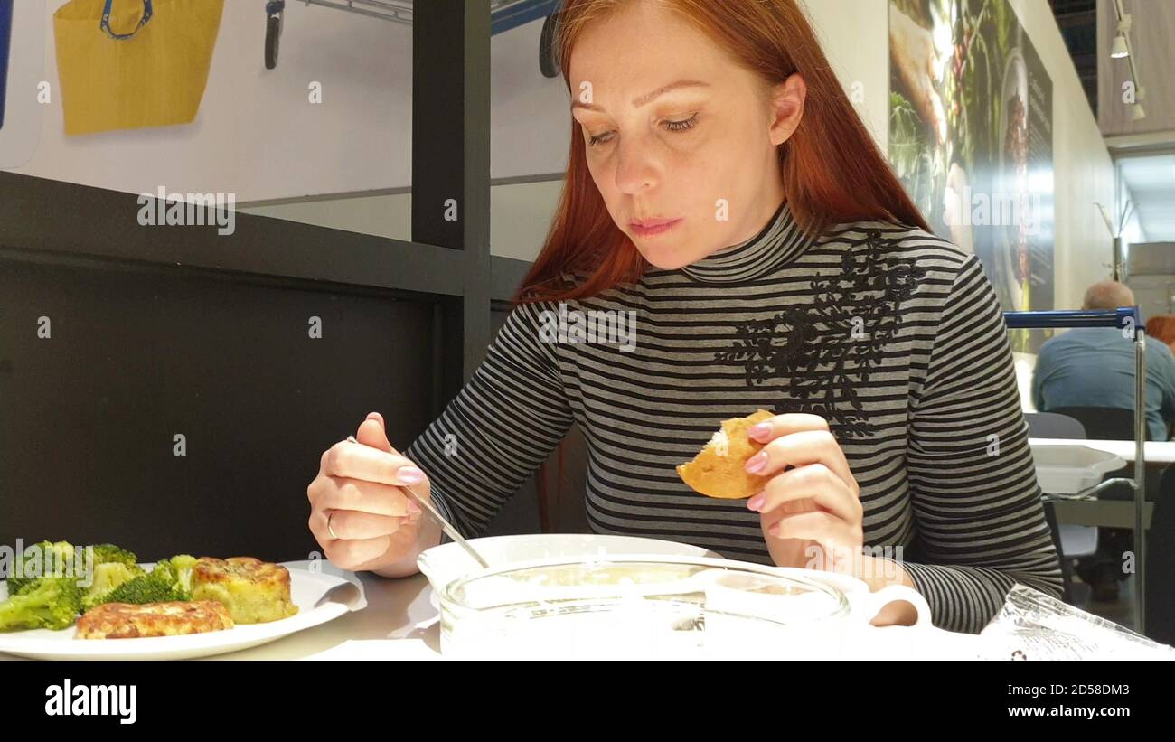young business woman having lunch in fast food restaurant Stock Photo ...
